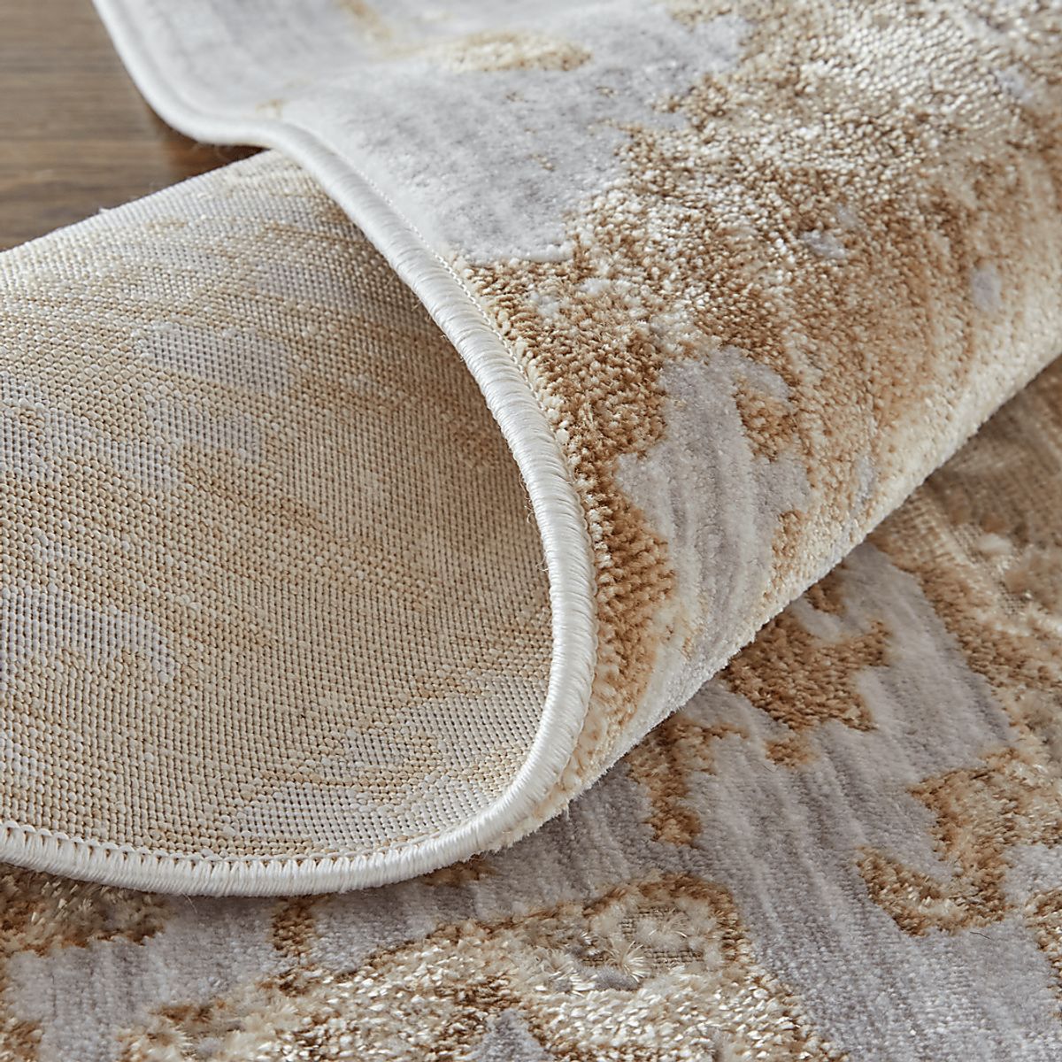 Kyva Ivory,Tan Beige,Brown Rugs | Rooms to Go