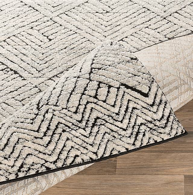 Lakima Ivory Beige Rug | Rooms to Go