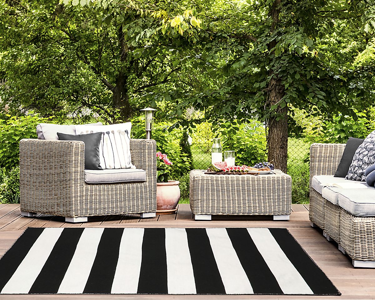 Lorahorn Black,White Outdoor Rugs | Rooms to Go
