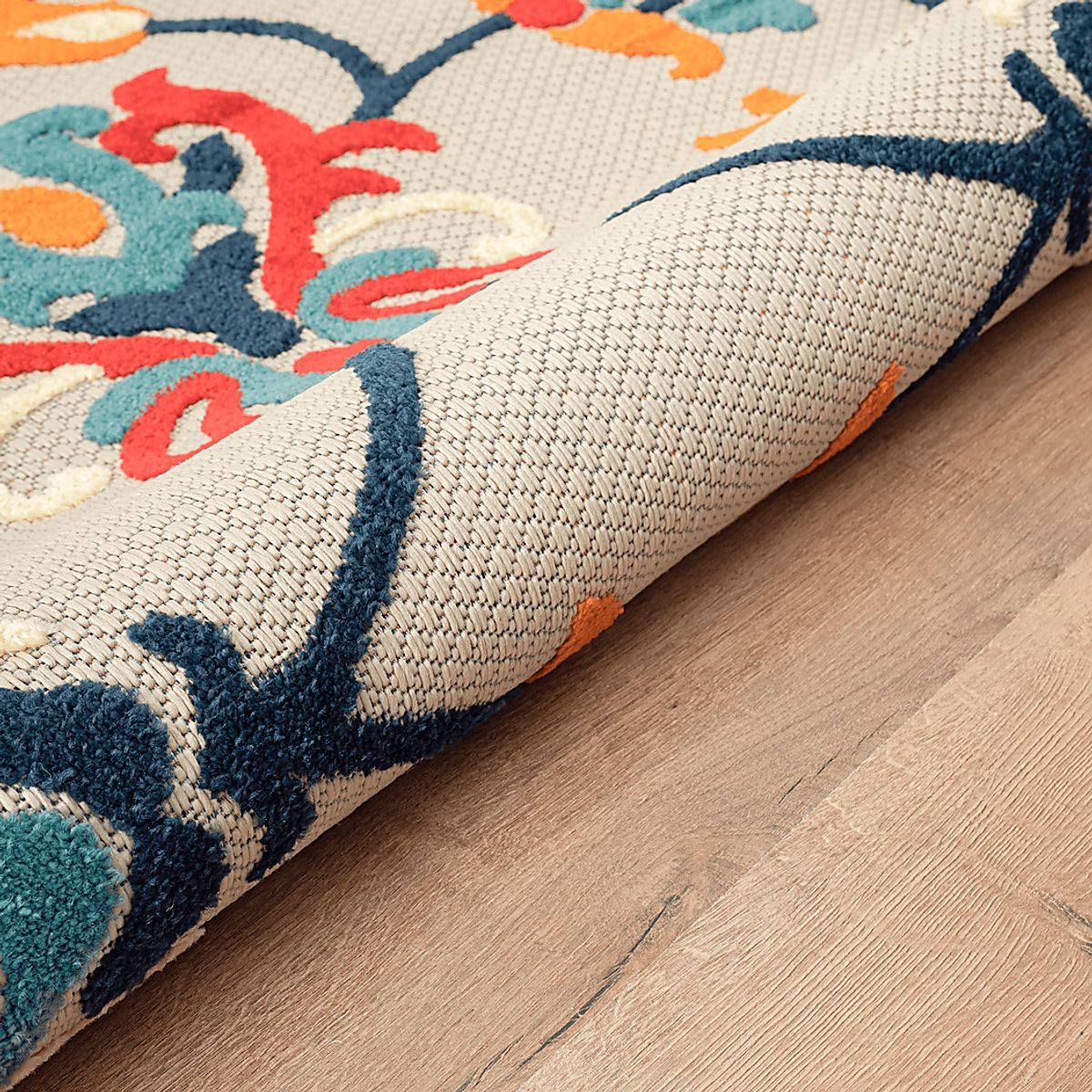 Lusetrie Multi,Orange Multi,Orange,Red Rugs | Rooms to Go