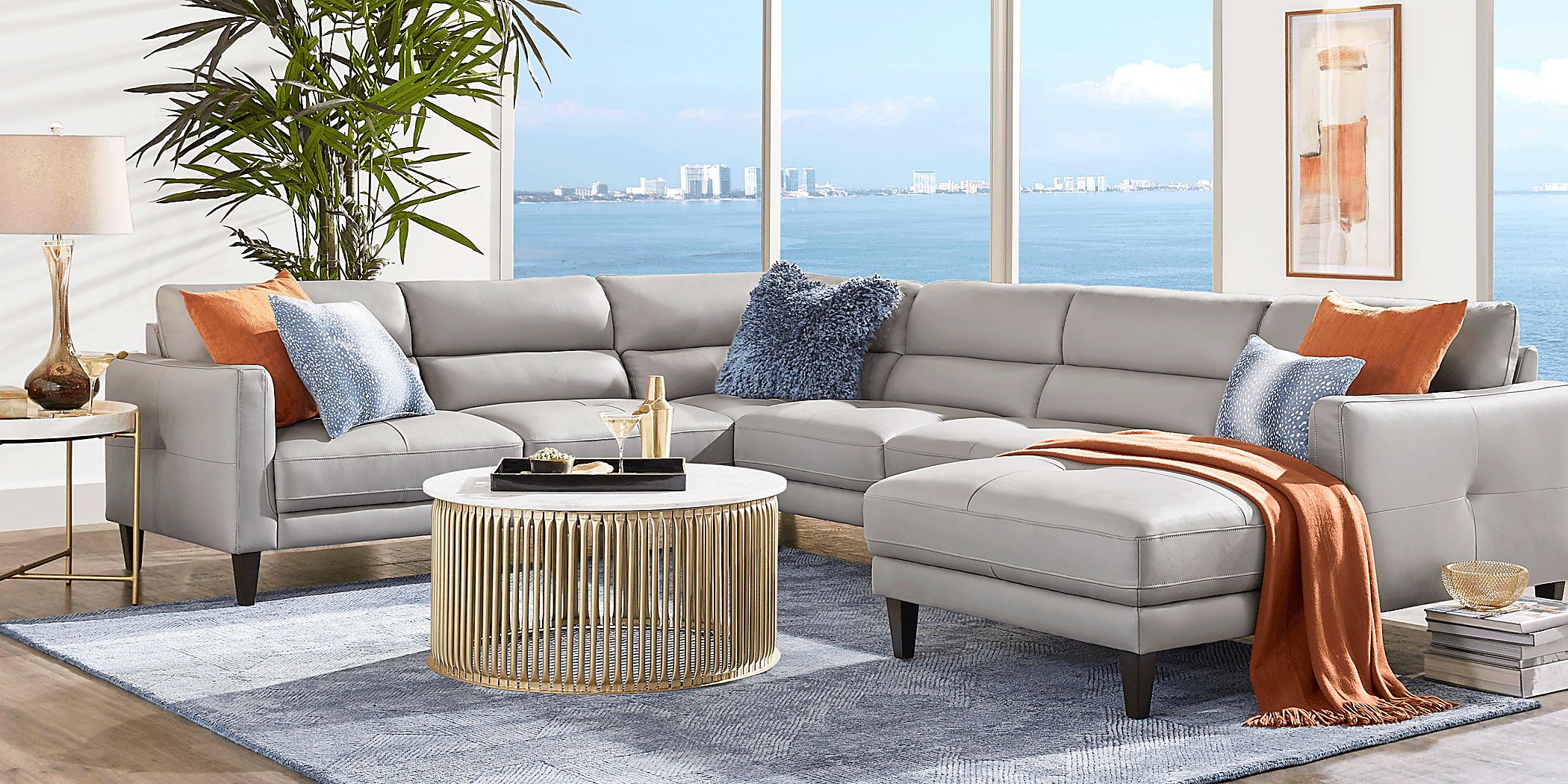 Marotta Light Gray Leather 4 Pc Right Arm Chaise Sectional | Rooms to Go