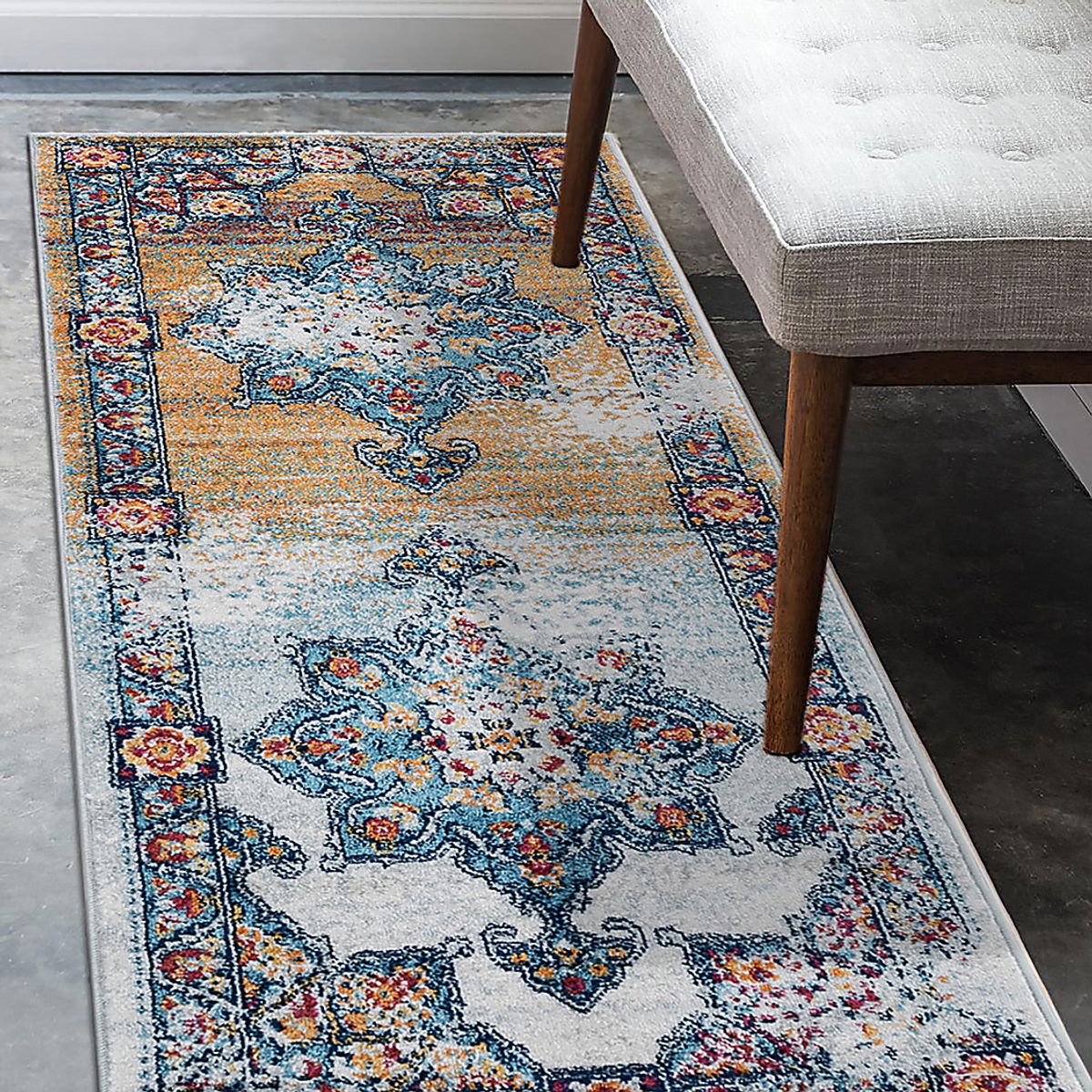 Melidon Orange Orange,Red Rugs | Rooms to Go