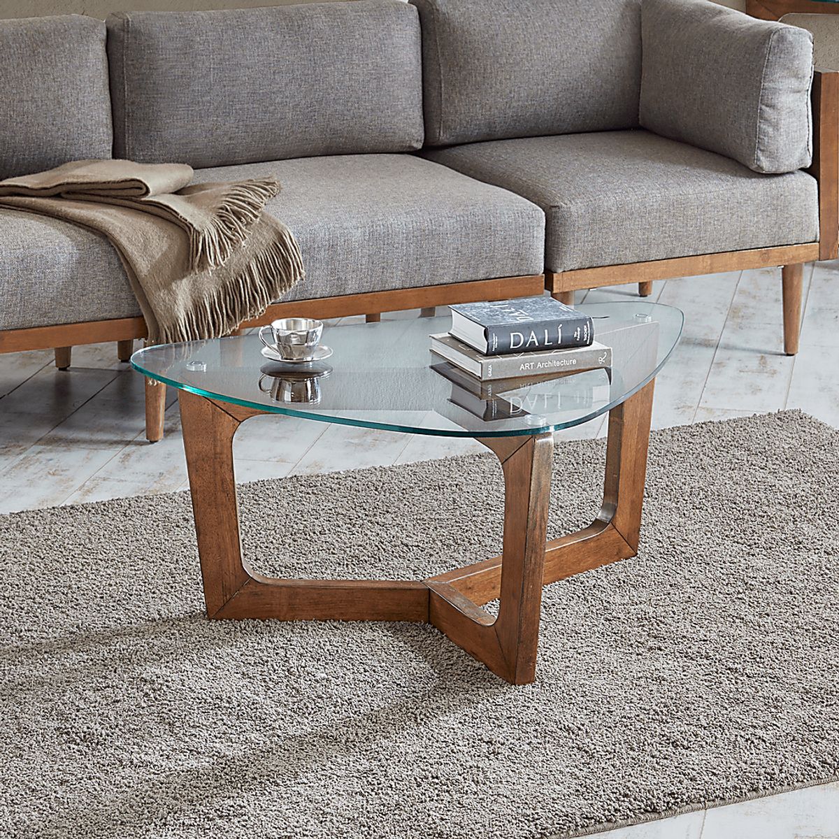 Meserole Brown Dark Wood Cocktail Table | Rooms to Go