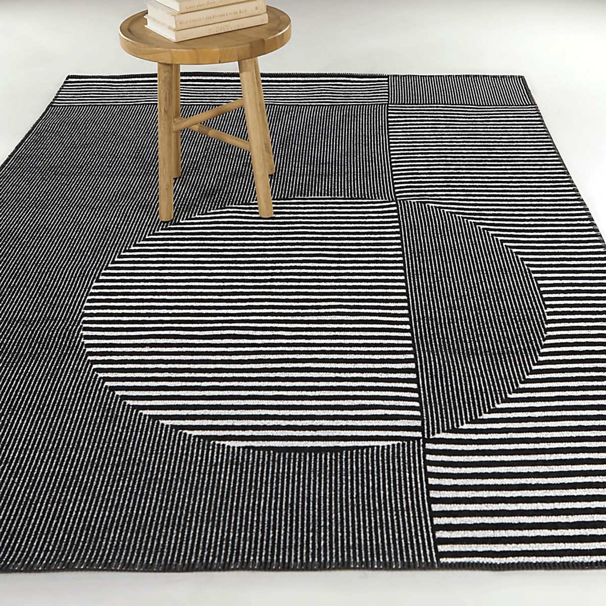 Metima Black Rugs | Rooms to Go