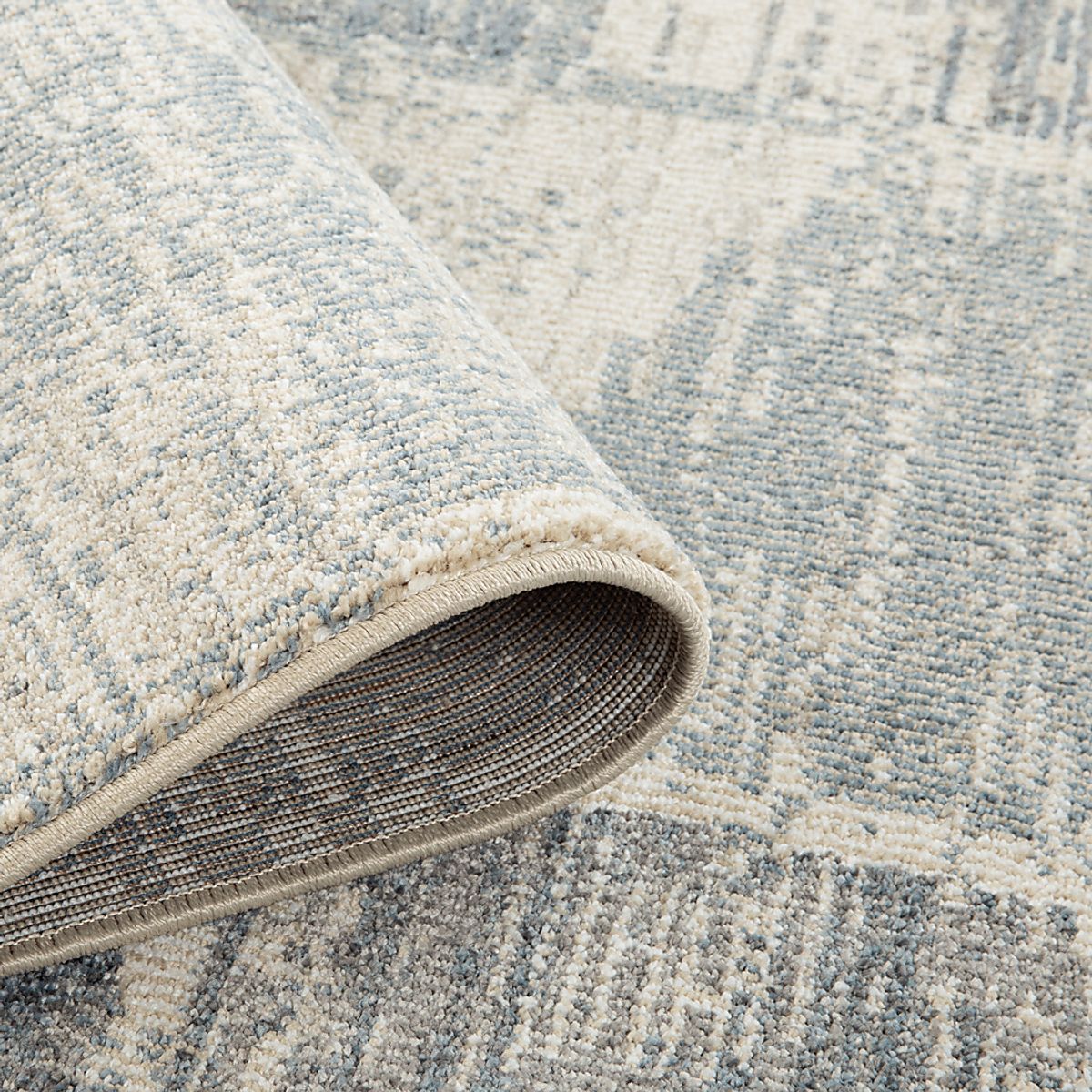Mooton Blue Rugs | Rooms to Go