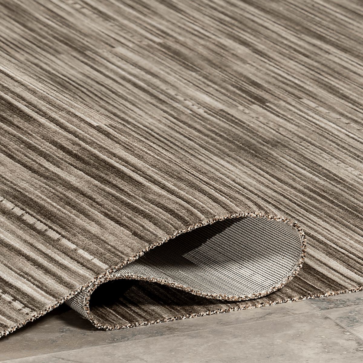 Nikanor Beige Rugs | Rooms to Go