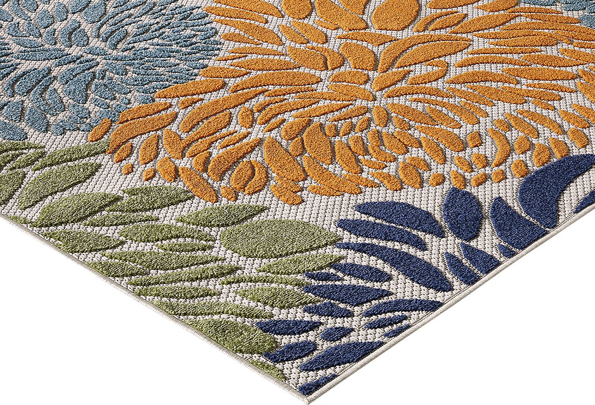 Nizsm Blue,Green,Orange Blue,Green,Orange,Red Outdoor Rugs | Rooms to Go