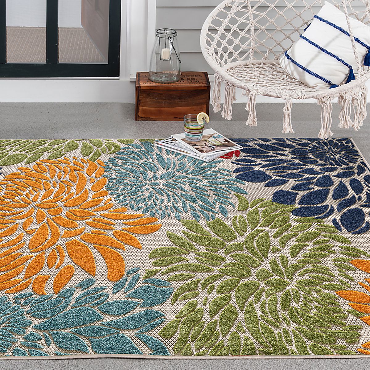 Nizsm Blue,Green,Orange Blue,Green,Orange,Red Outdoor Rugs | Rooms to Go