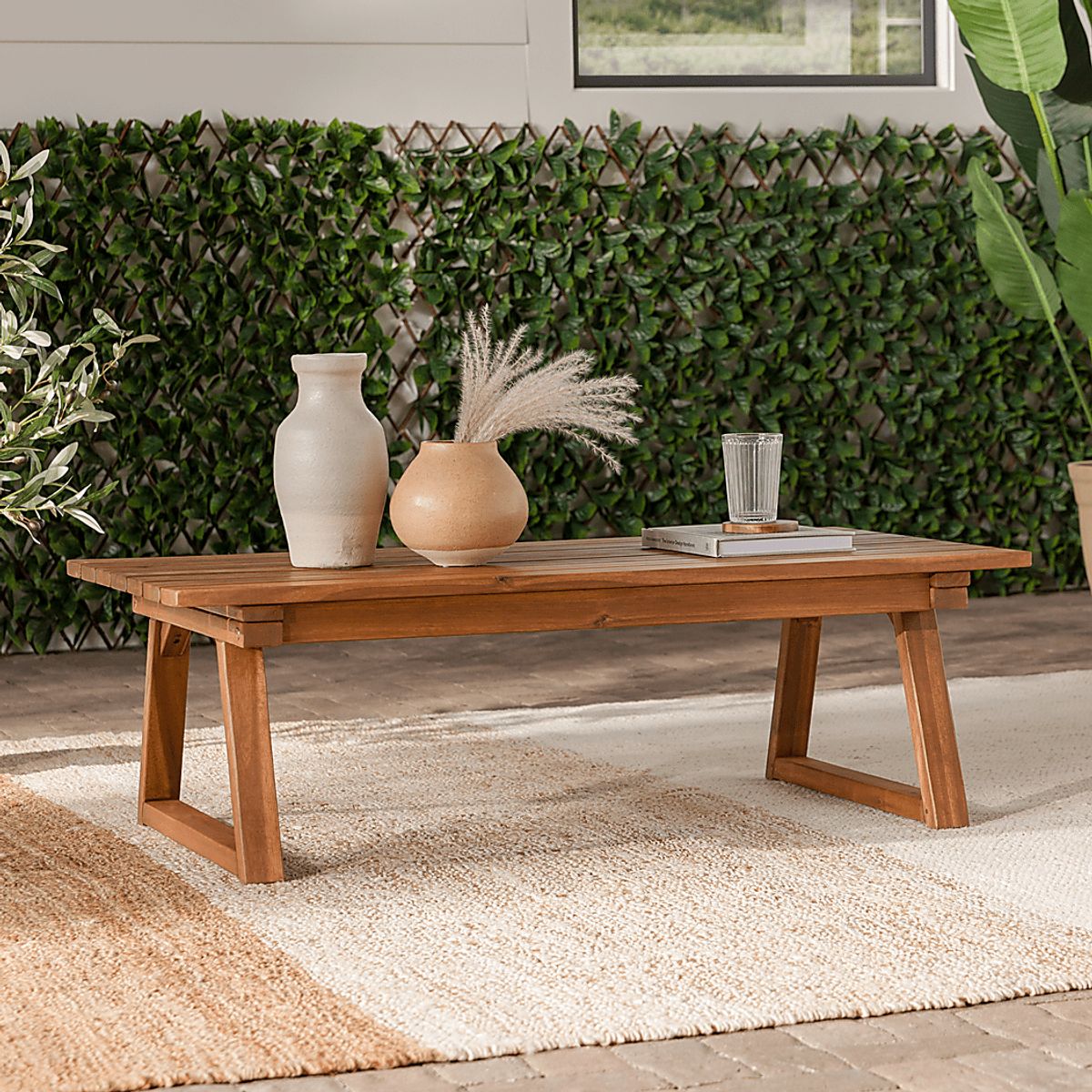 Arborhazy Brown Dark Wood Acacia Outdoor Cocktail Table | Rooms to Go
