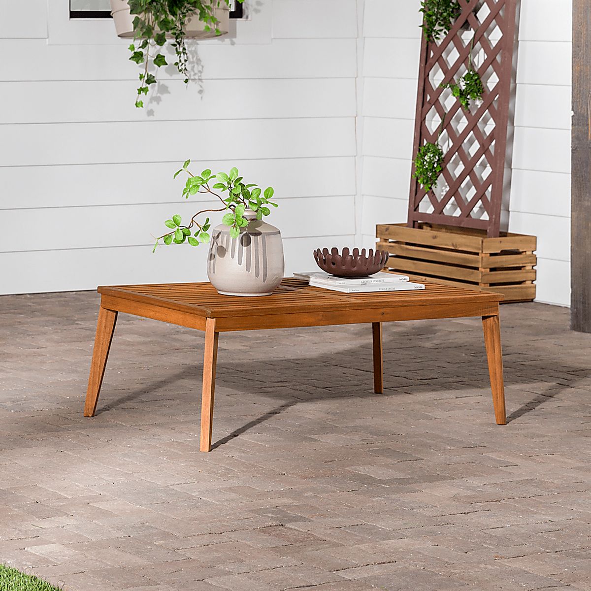Baypool Brown Dark Wood Outdoor Cocktail Table | Rooms to Go