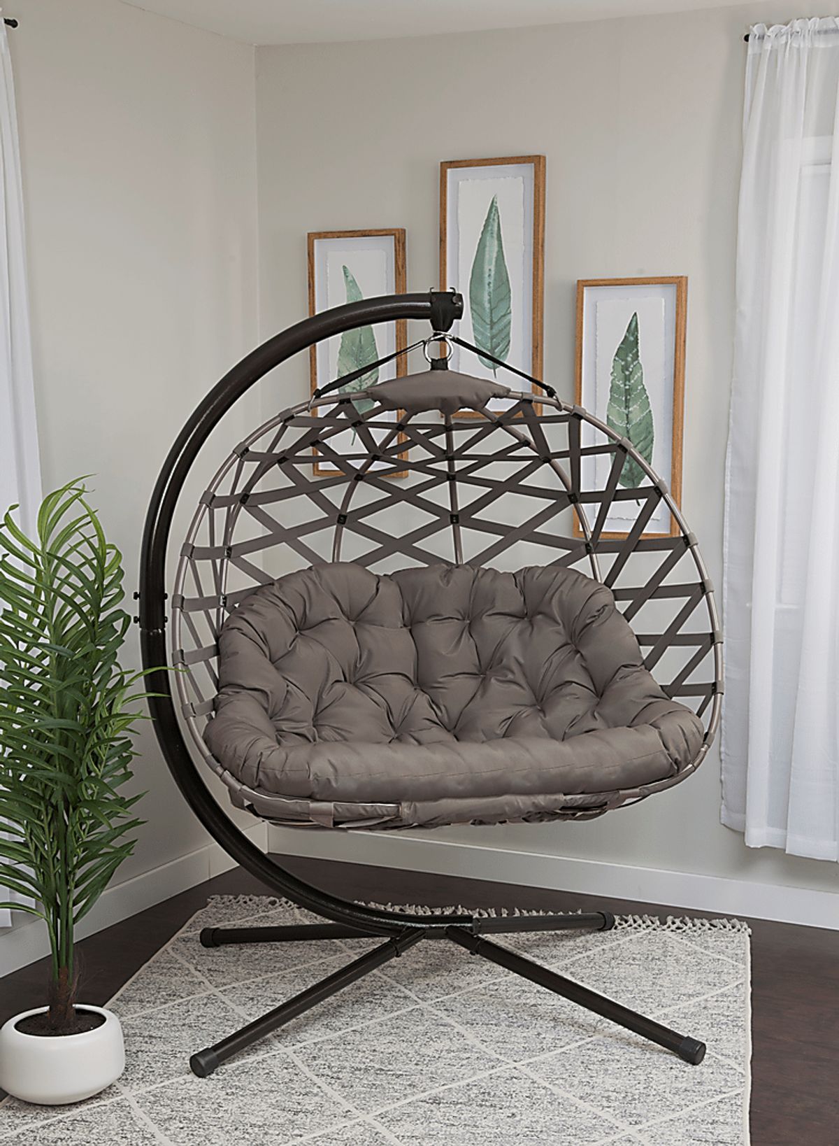Hollette Brown Outdoor Hanging Loveseat | Rooms to Go