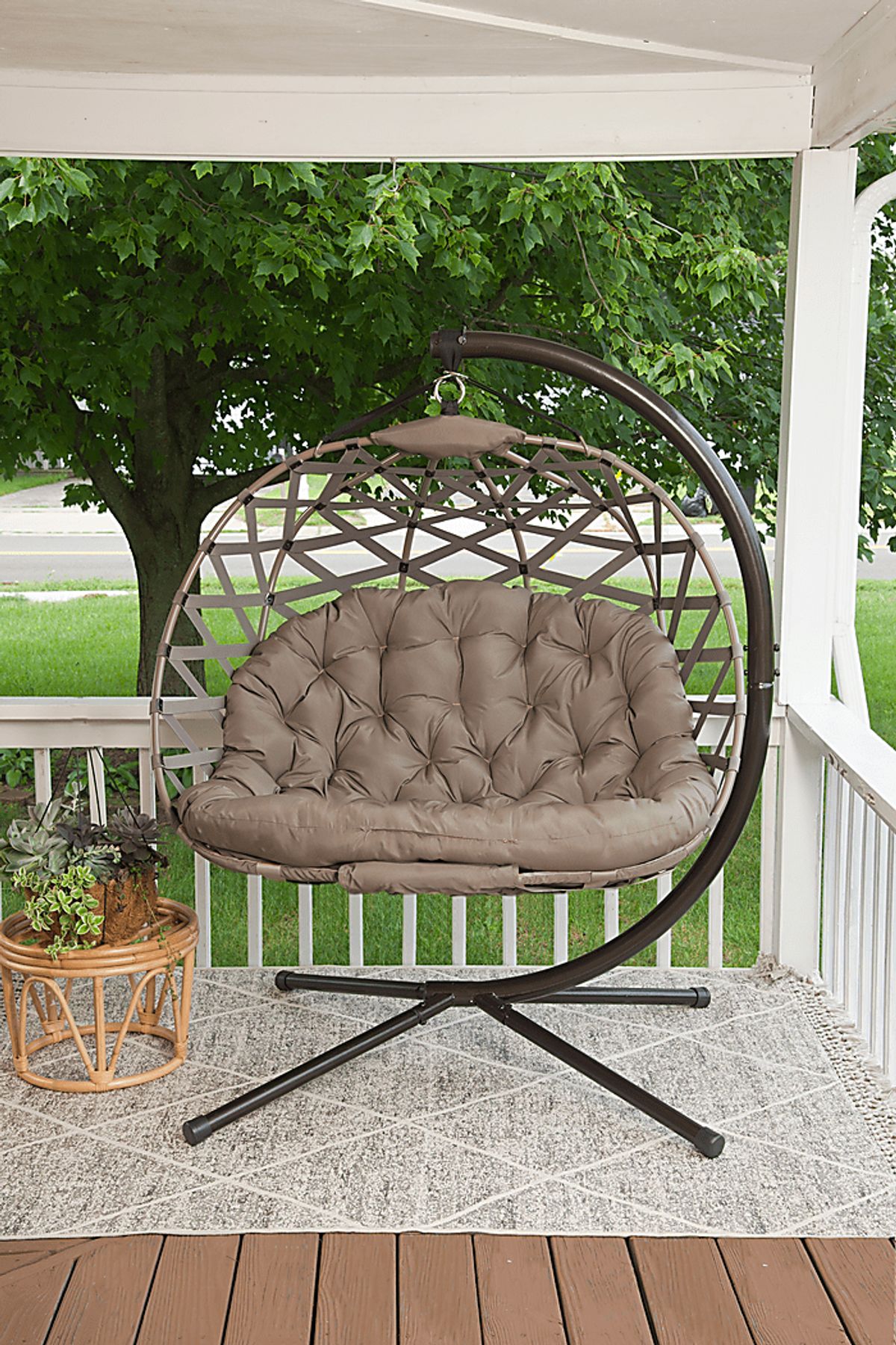 Hollette Brown Outdoor Hanging Loveseat | Rooms to Go