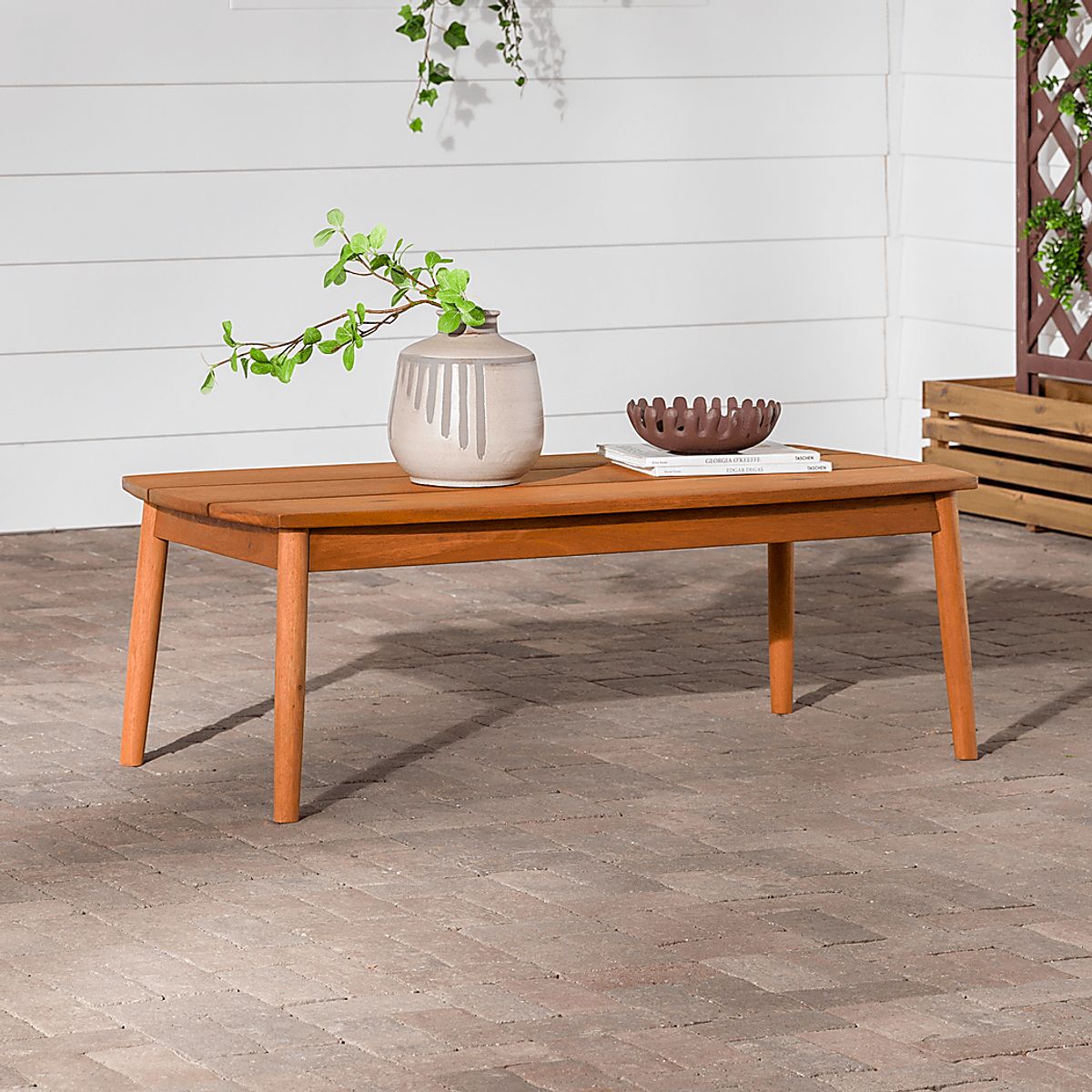 Shellrich Coast Brown Dark Wood Outdoor Cocktail Table | Rooms to Go