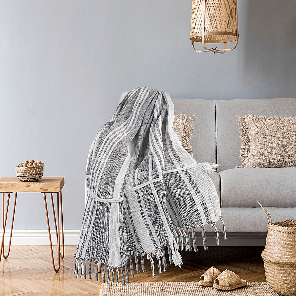 Oxwell Gray Throw Blanket | Rooms to Go