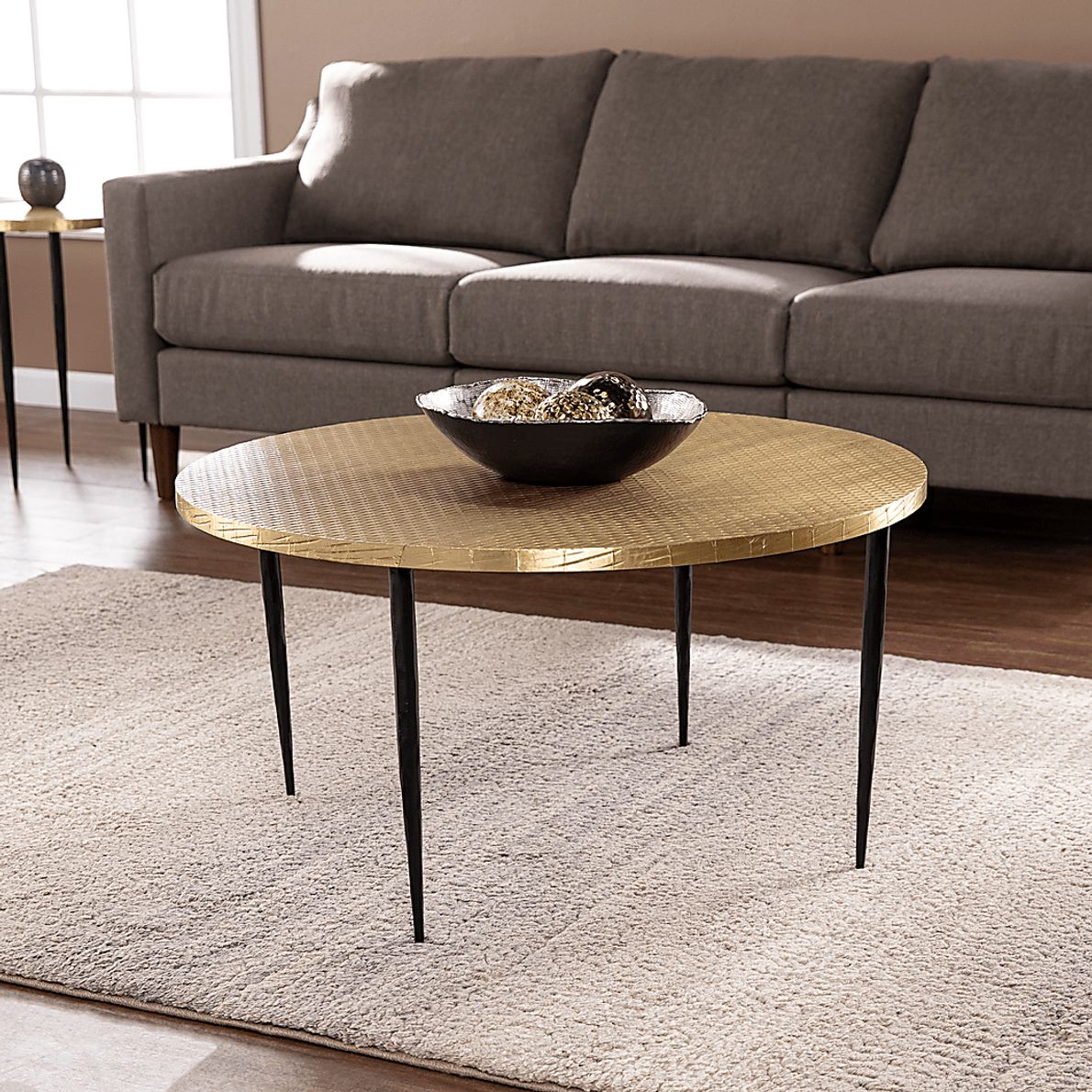 Pellinore Brass Cocktail Table - Rooms To Go