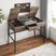Romare Gray Lift Top Desk - Rooms To Go