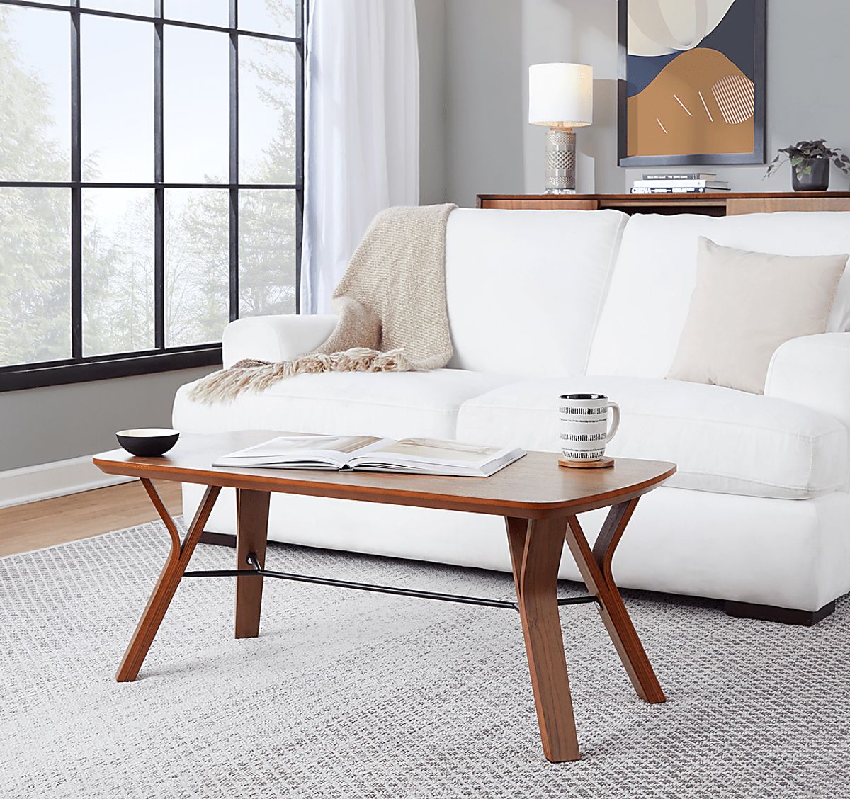 Rushworth I Walnut Dark Wood Cocktail Table | Rooms to Go