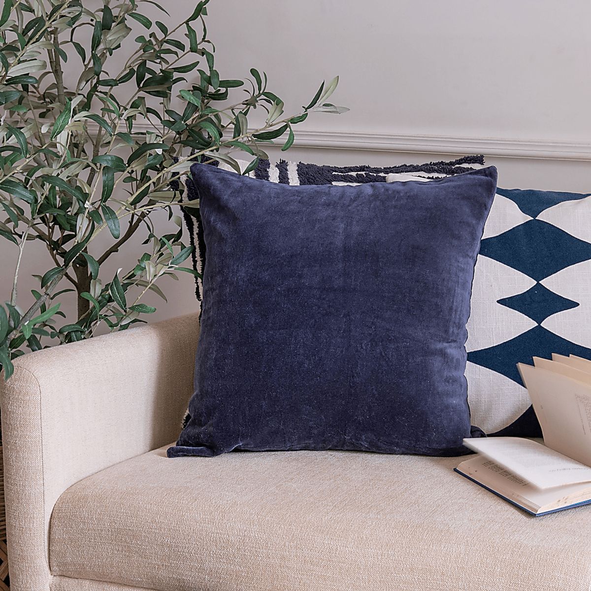 Theus Dark Blue Accent Pillow | Rooms to Go