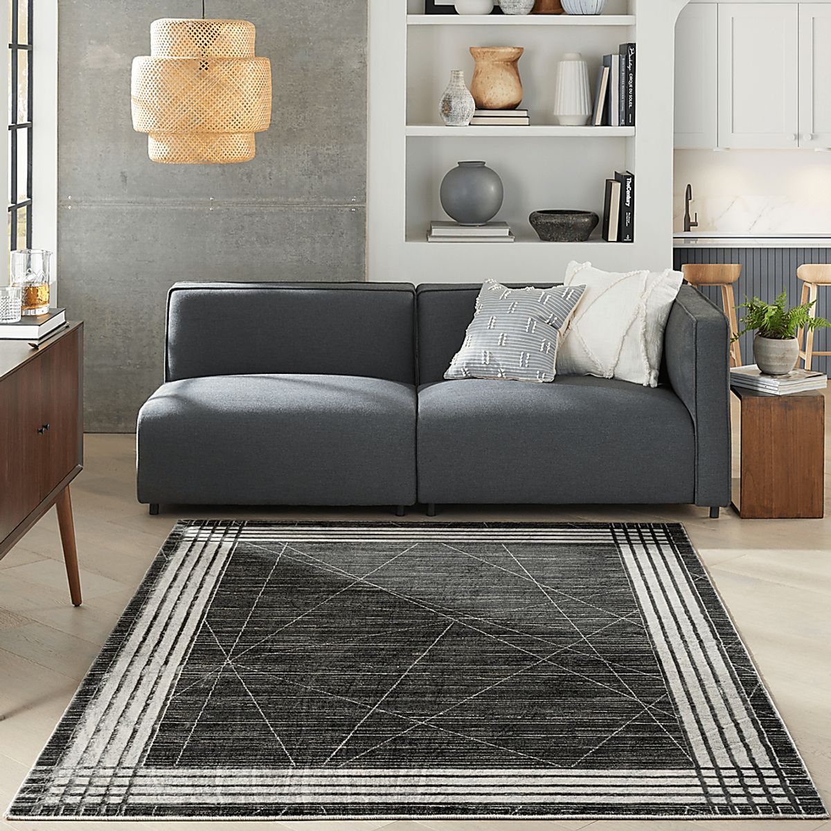 Susson Charcoal Black,Gray Rugs | Rooms to Go