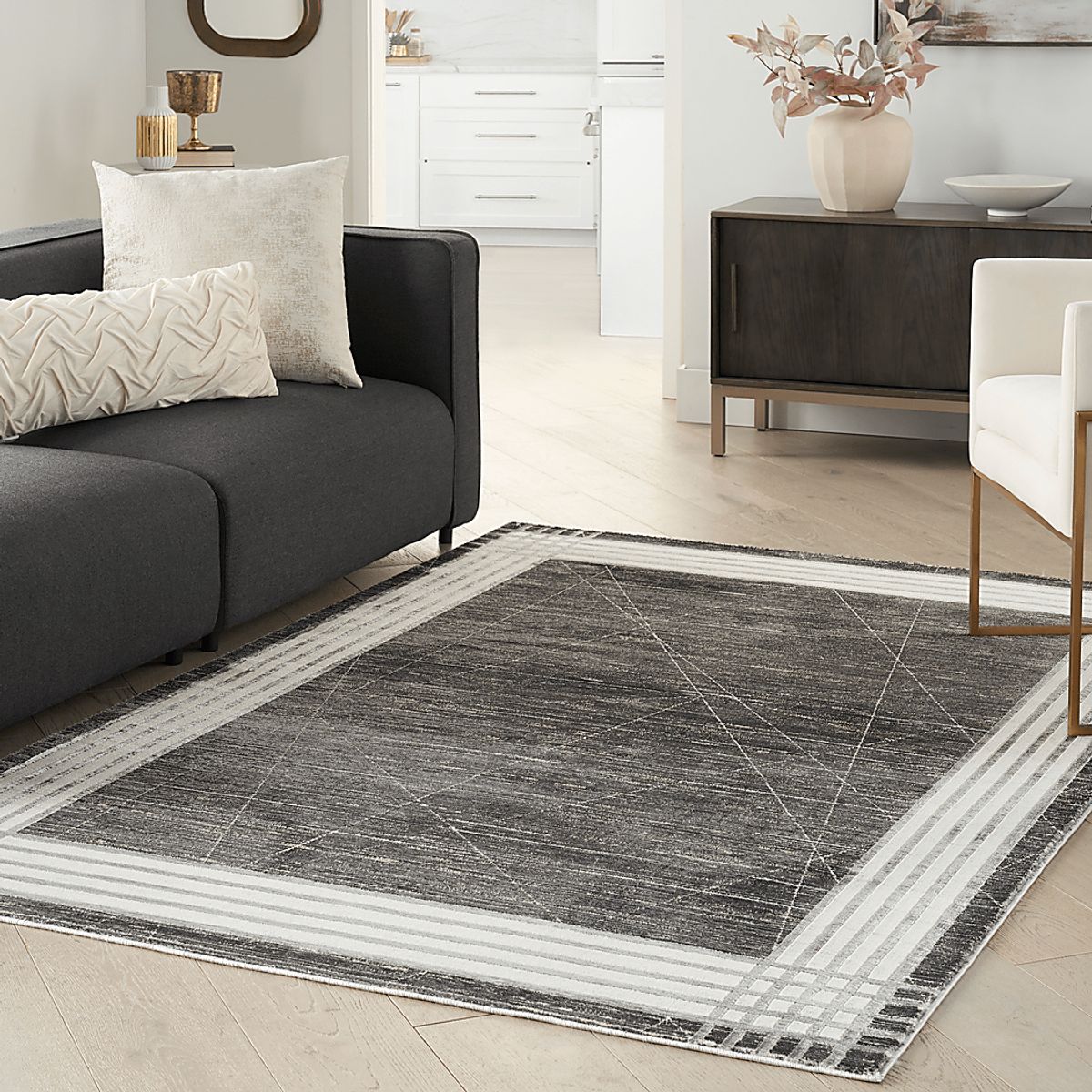 Susson Charcoal Black,Gray Rugs | Rooms to Go