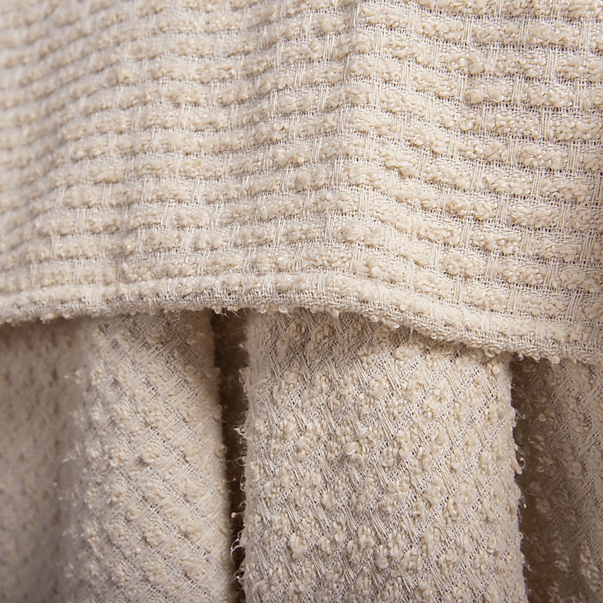 Tormi Cream Beige Outdoor Throw Blankets | Rooms to Go