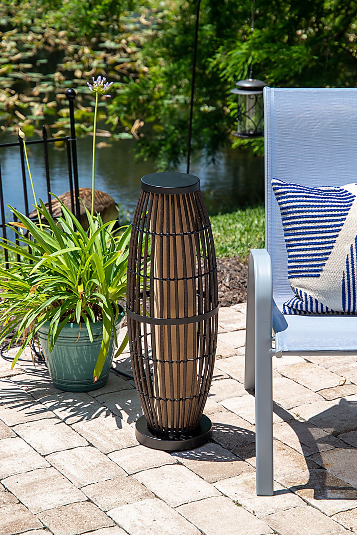 Unaka Brown Outdoor Table Lamp | Rooms to Go