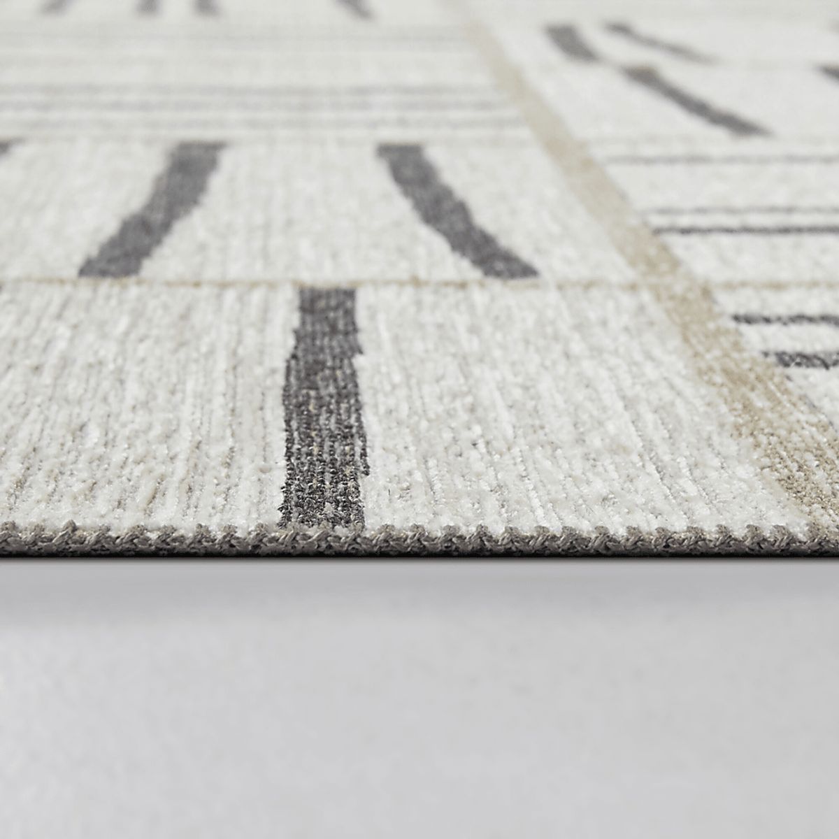 Uppas Cream Beige Rugs | Rooms to Go