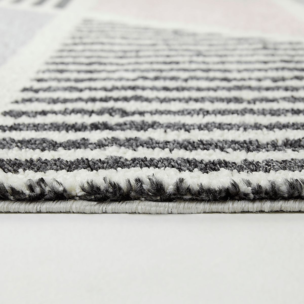 Woodfall Pink Rugs | Rooms to Go