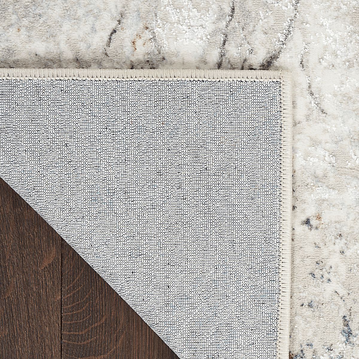 Woodport Gray Rugs | Rooms to Go