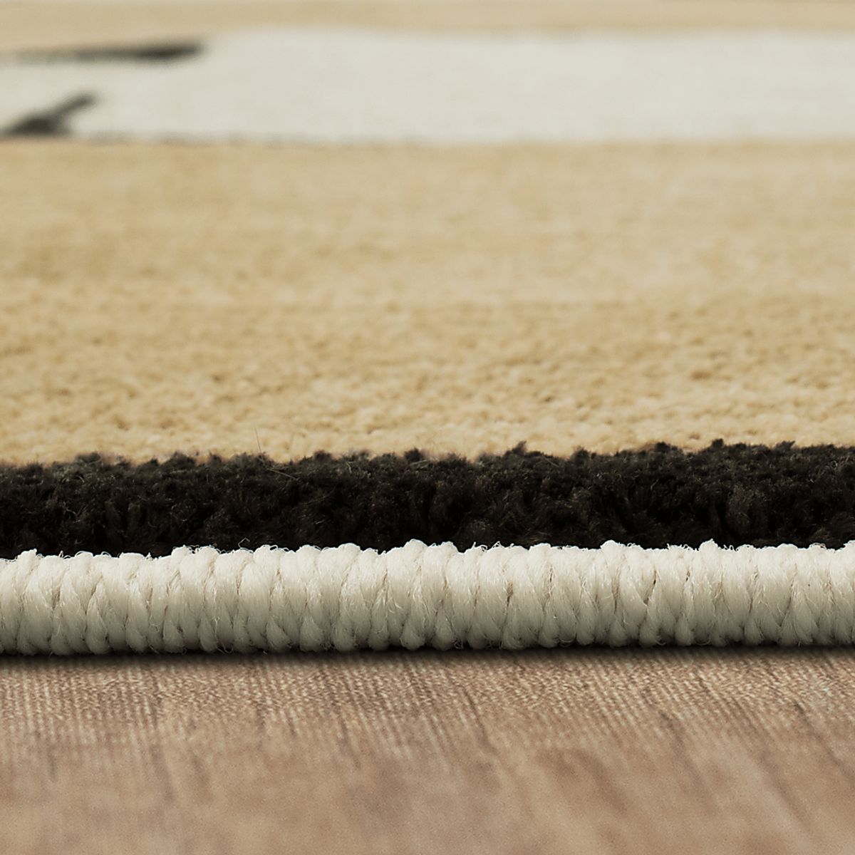 Zuhu Cream Beige Rug | Rooms to Go