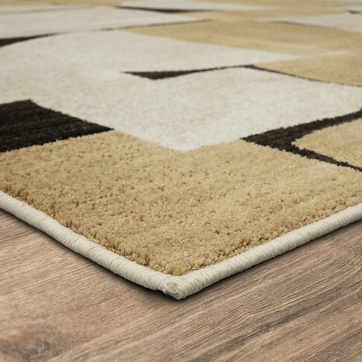 Zuhu Cream Beige Rug | Rooms to Go