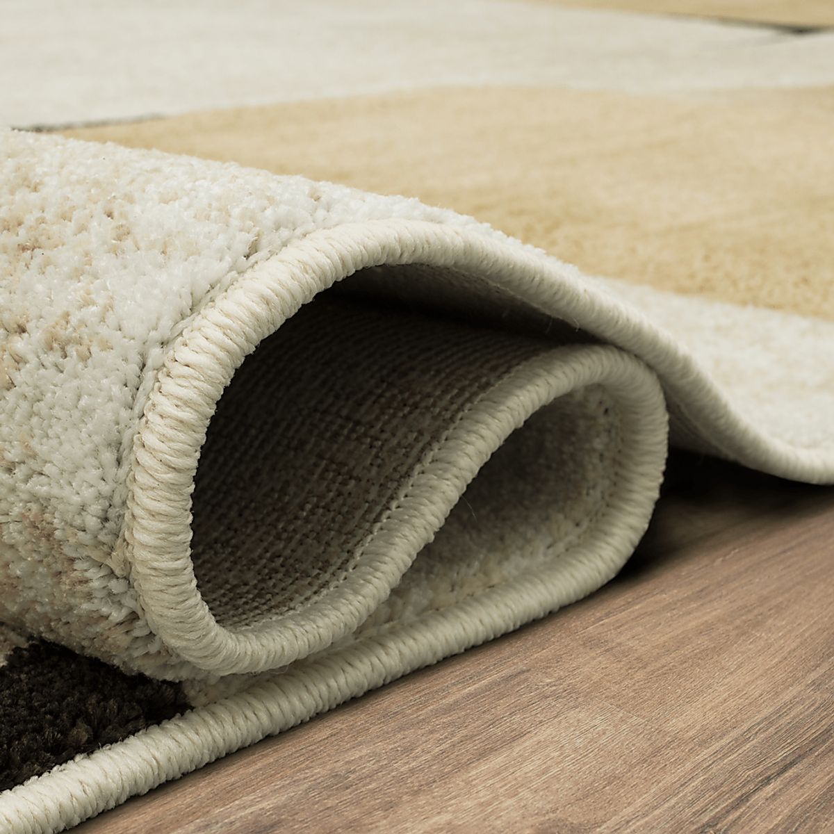 Zuhu Cream Beige Rug | Rooms to Go